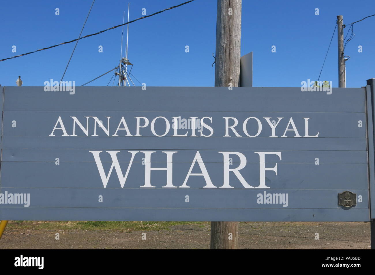 White capital letters on a smart grey wooden board signpost that you're ...
