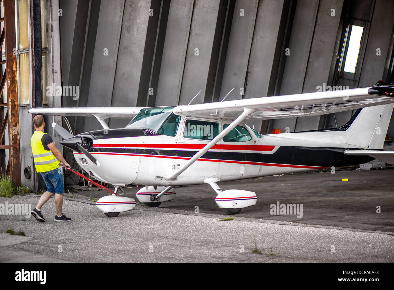 Single engine aircraft, ultra light plane ready for flight. Pilot is ...