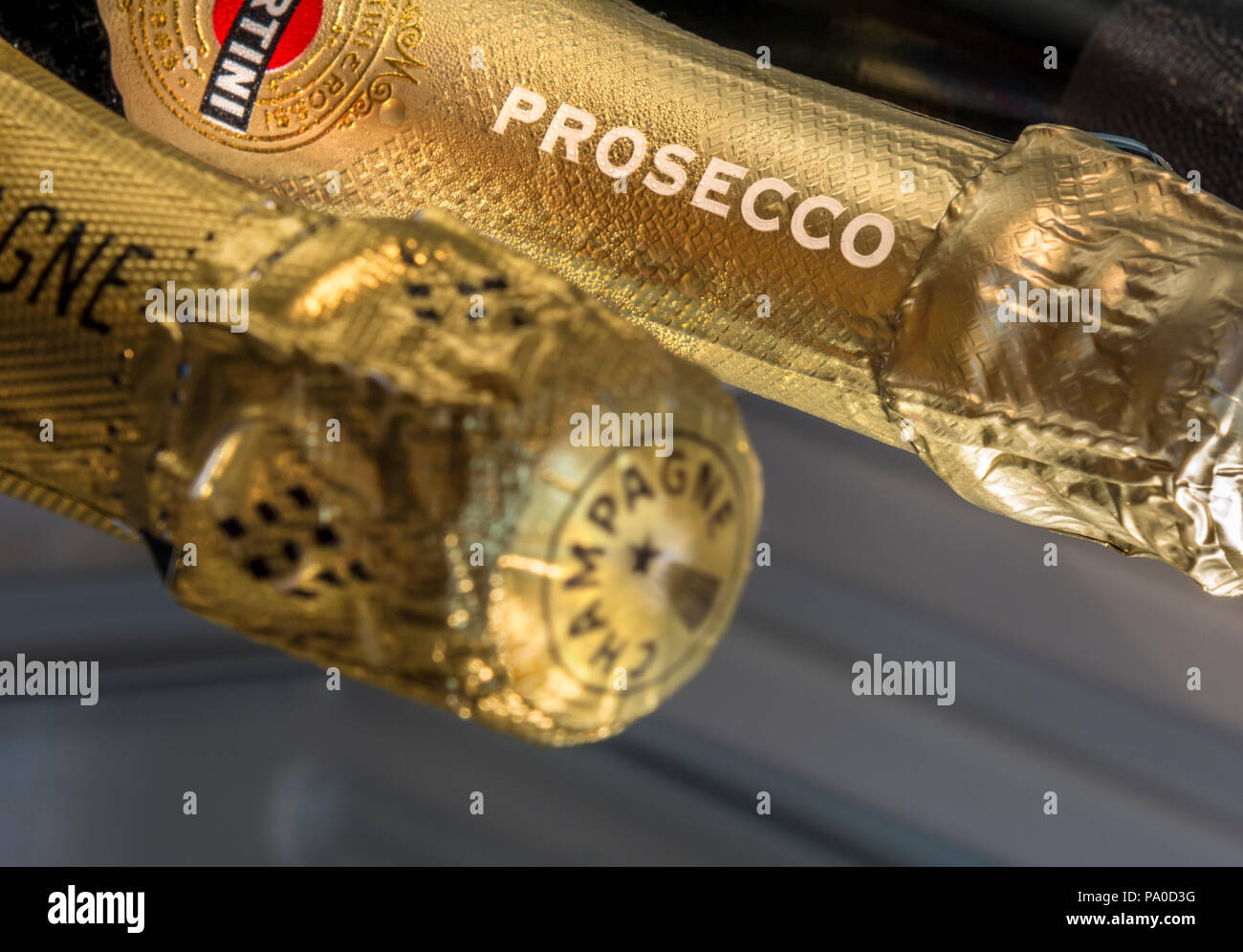 Close up on featured Prosecco name on foil neck sparkling wine bottle ...