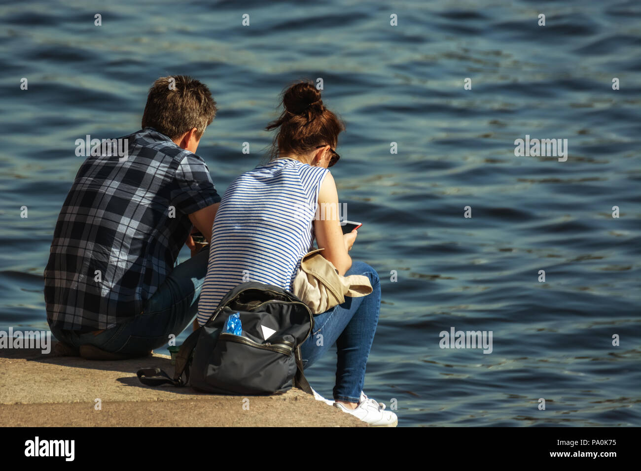 Sit on parapet hi-res stock photography and images - Alamy