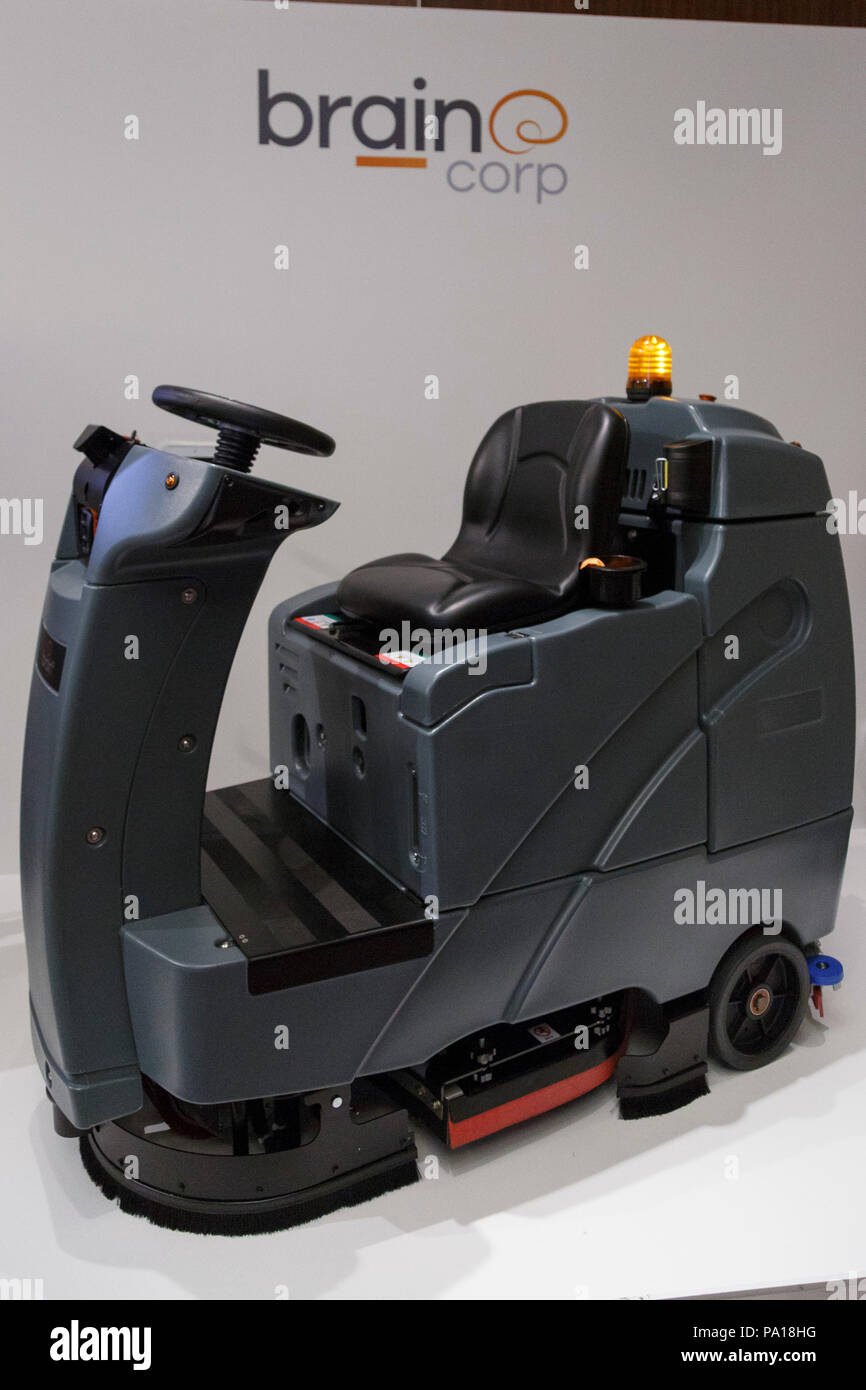 A self-driving floor scrubber on display during the SoftBank World 2018 ...