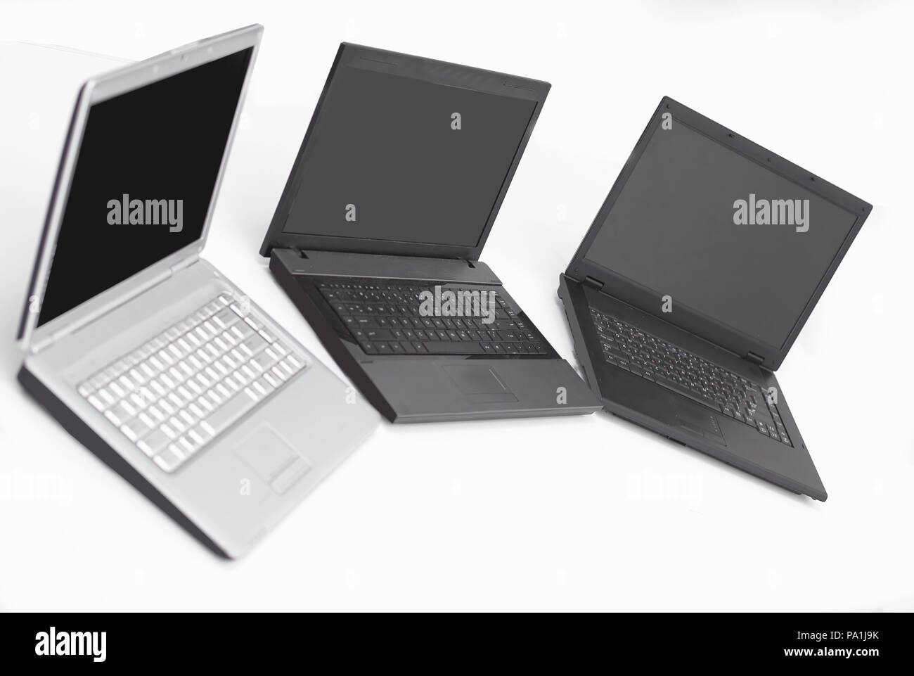 open laptop on the desktop in an empty office Stock Photo - Alamy