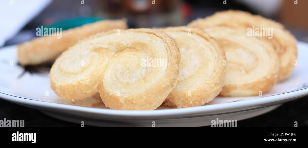 close up. delicious homemade cookies on blurred background Stock Photo ...
