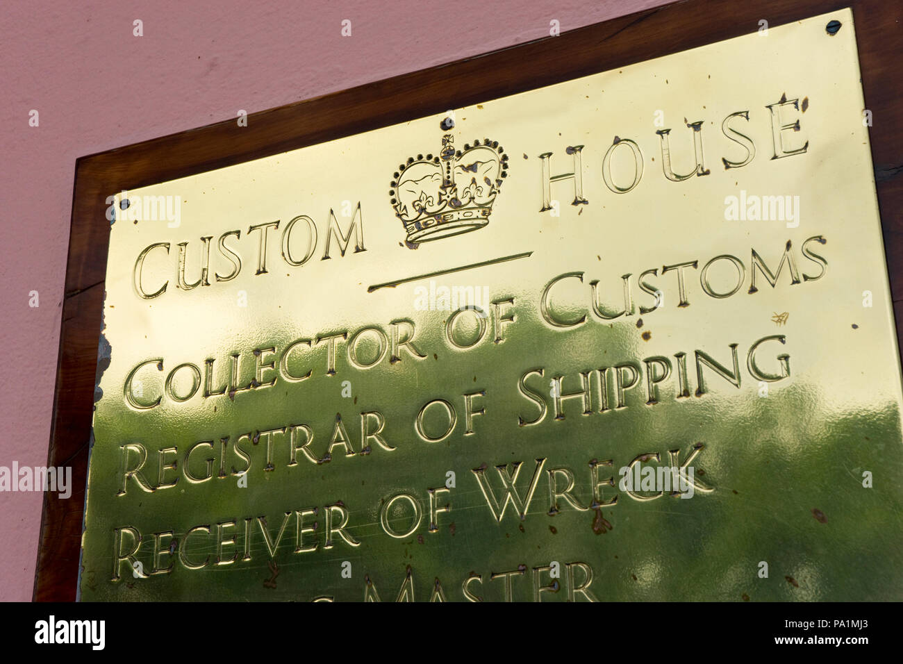 A brass sign lists the offices in the Customs House on Front Street in ...
