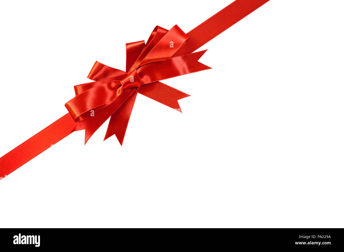 Corner diagonal red bow gift ribbon isolated on white Stock Photo - Alamy