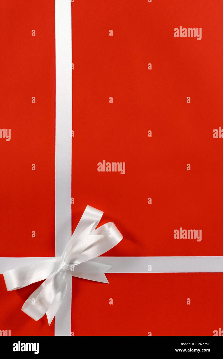 Christmas border red background gift bow ribbon vertical Stock Photo ...