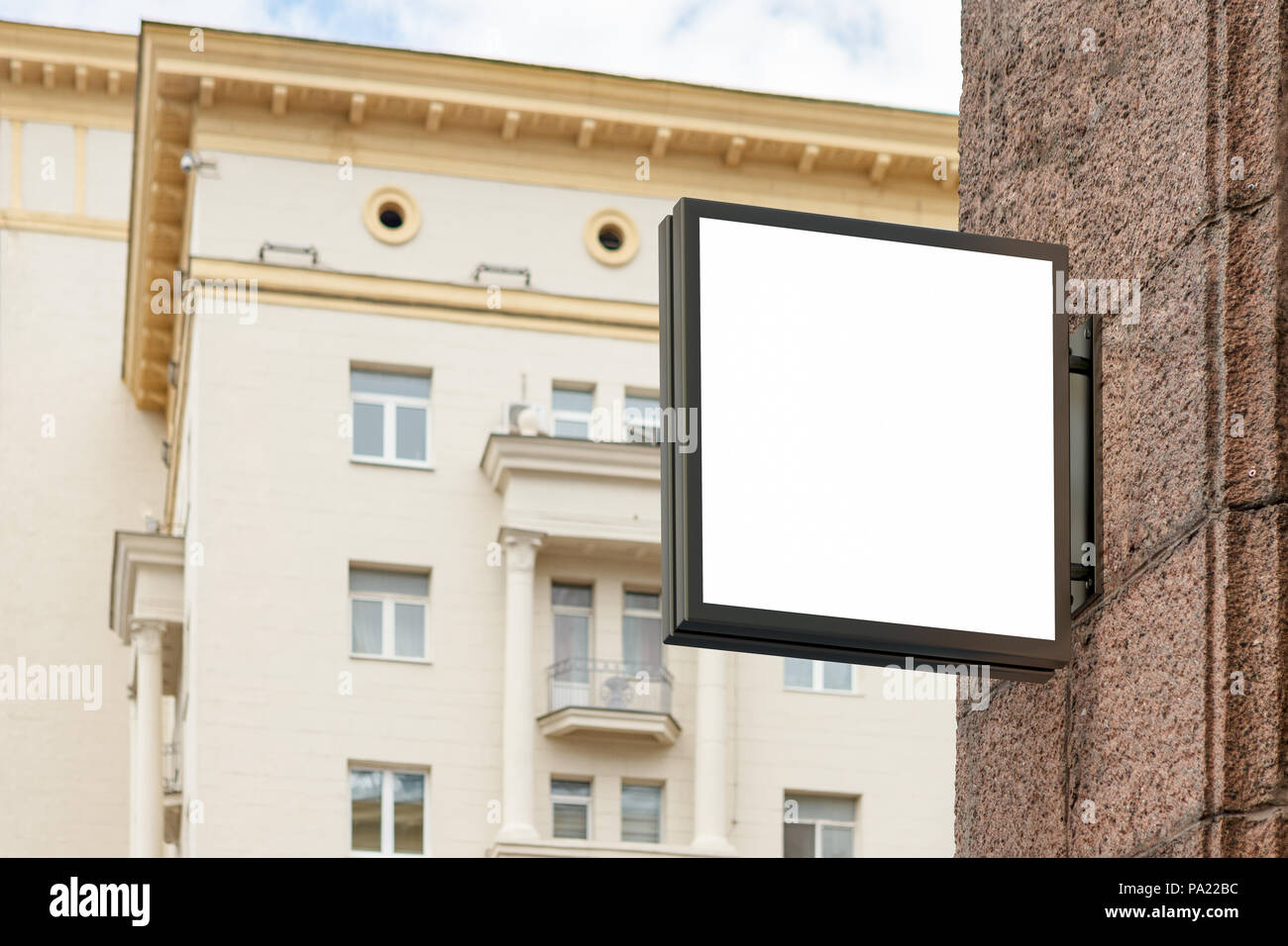 Blank square singboard on the granite wall Stock Photo - Alamy