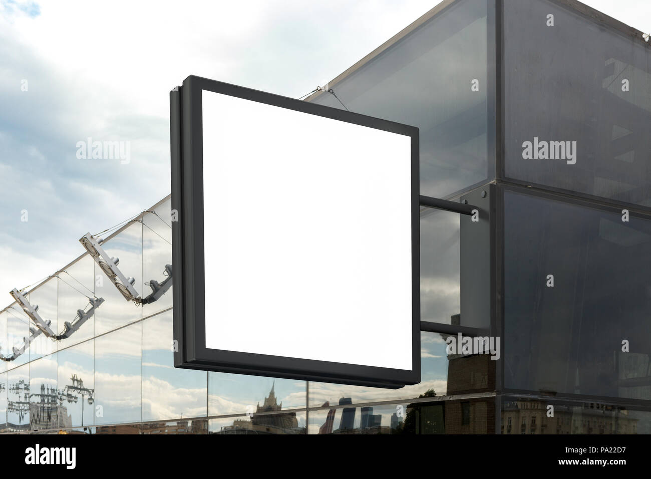 Blank square singboard on the glass wall Stock Photo - Alamy