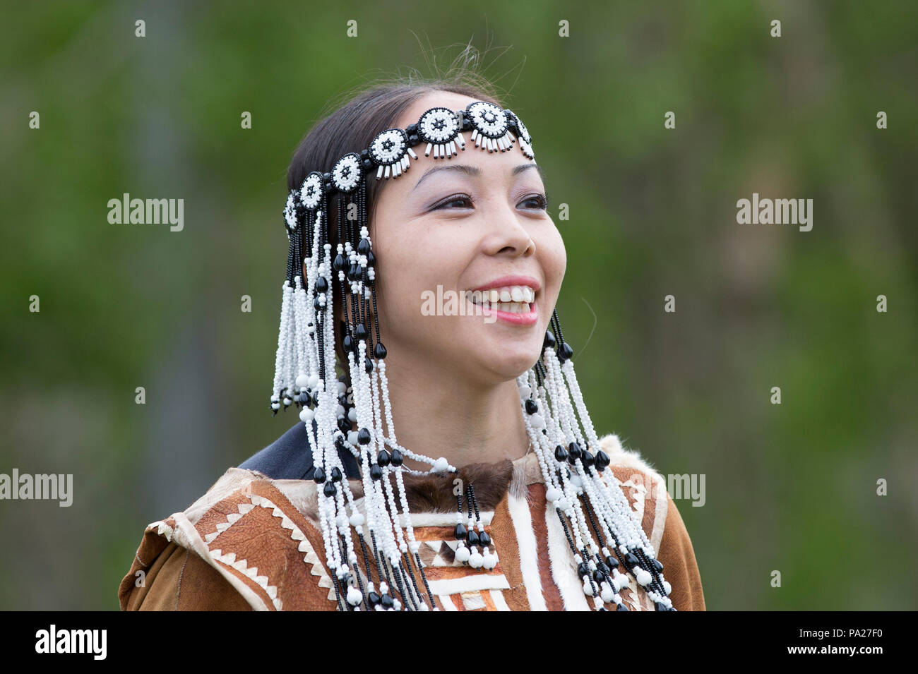 Woman in traditional dress, Petropavlovsk-Kamchatskiy, Kamchatka Stock ...
