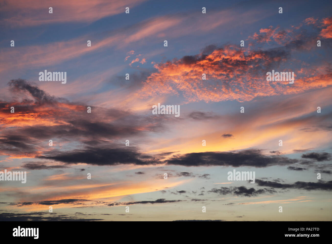 Texture of bright evening sky during sunset Stock Photo - Alamy