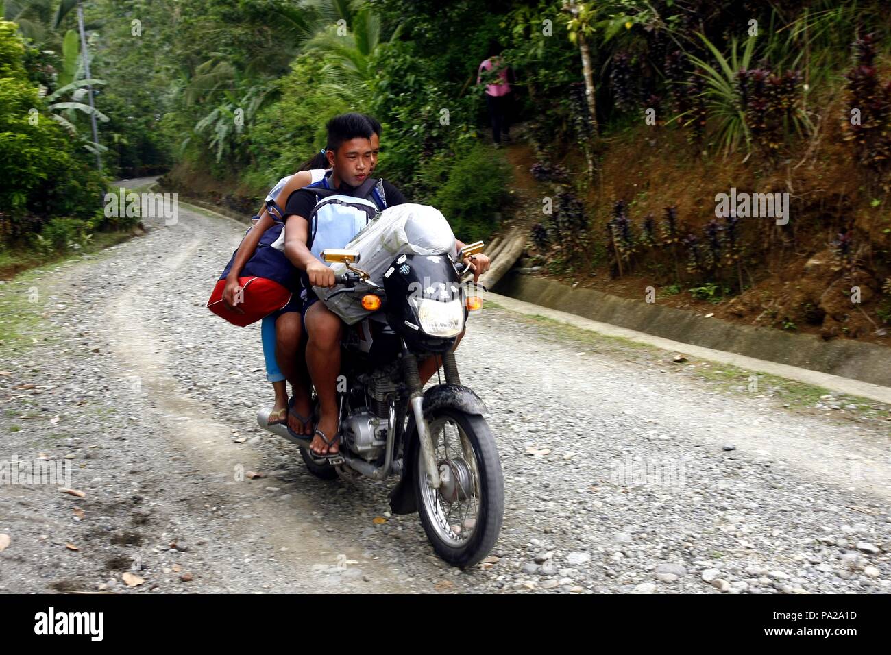 CAINTA, RIZAL, PHILIPPINES - OCTOBER 2, 2015: A young man and his ...