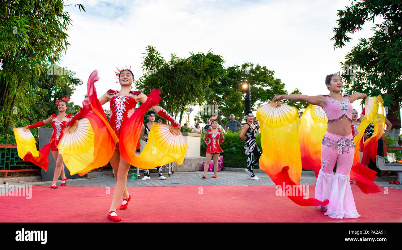 Young troupe of Chinese acrobats performing outside the China Pavilion ...