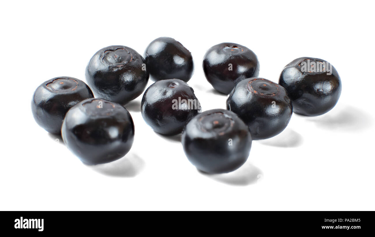 Glossy dark blueberries isolated on white background Stock Photo - Alamy