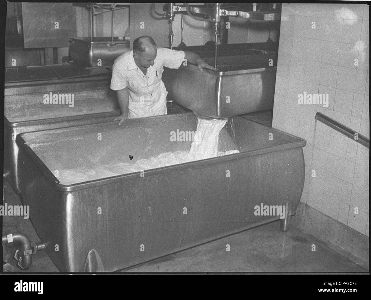 Dairy processing factory Black and White Stock Photos & Images - Alamy