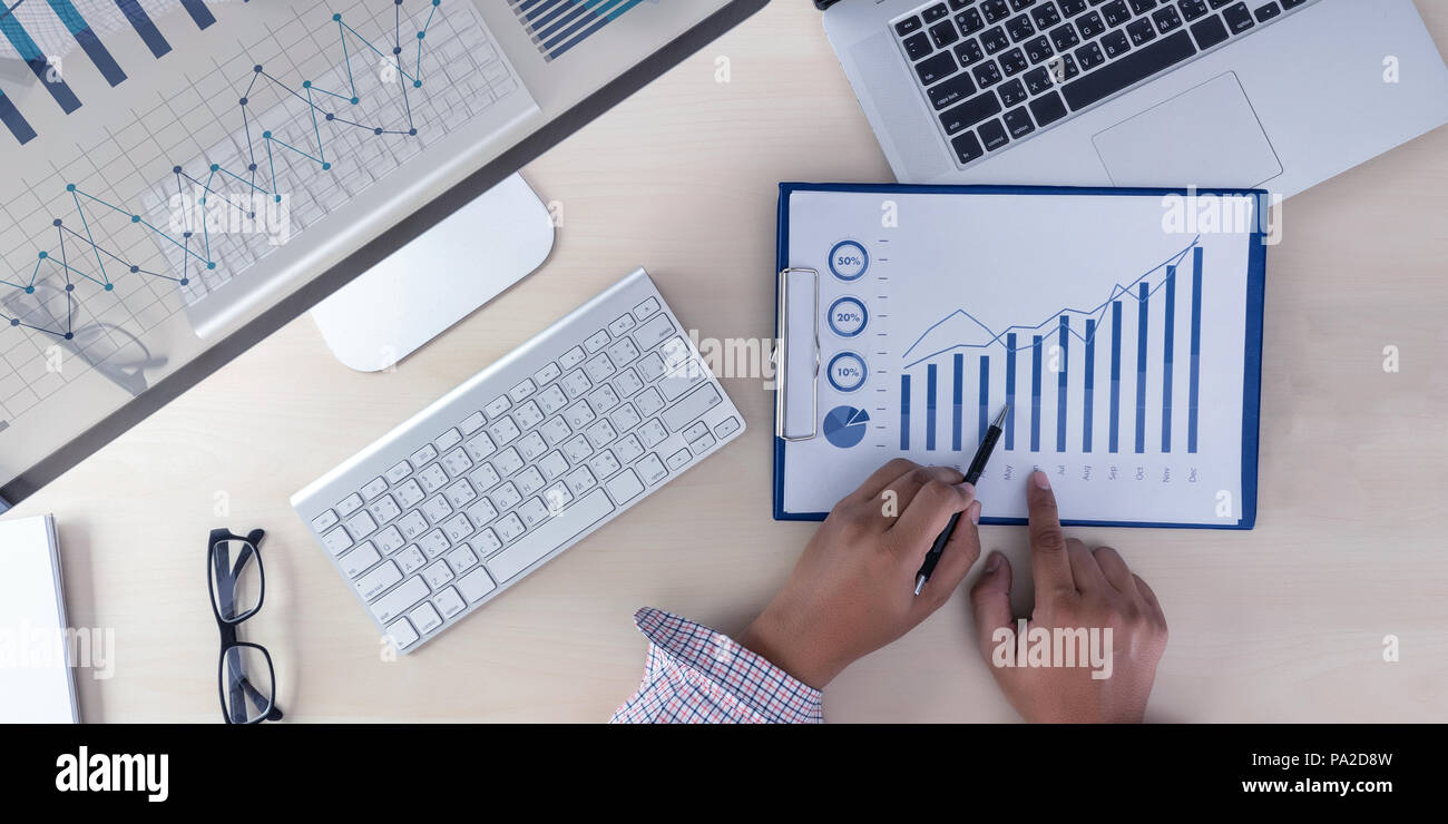 analyzing the work Accounting on Laptop investment concept Stock Photo ...