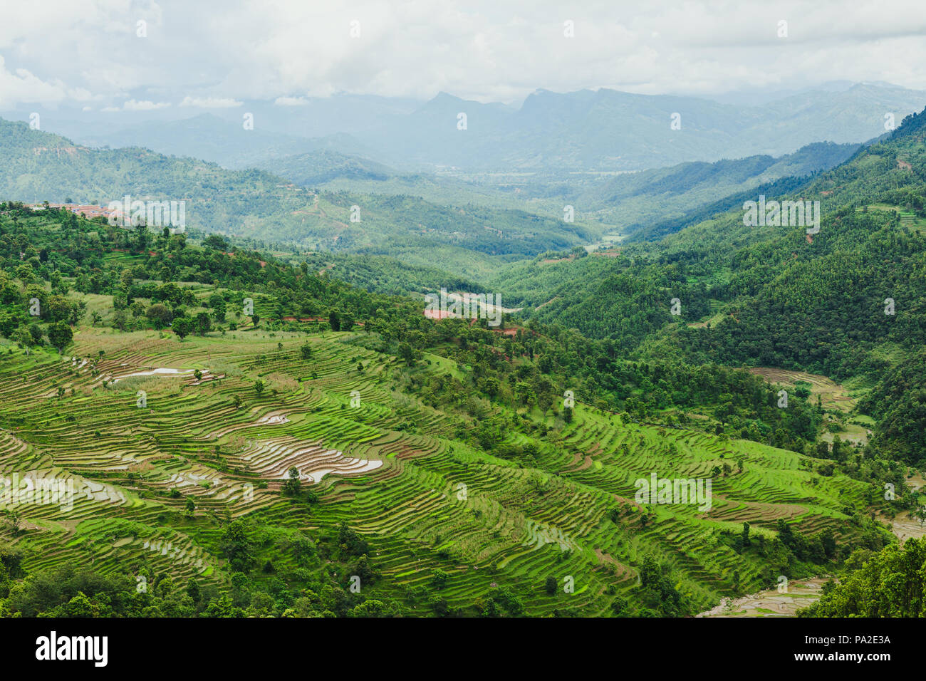 Scenery of beautiful Nepali rural village with mountains and green ...