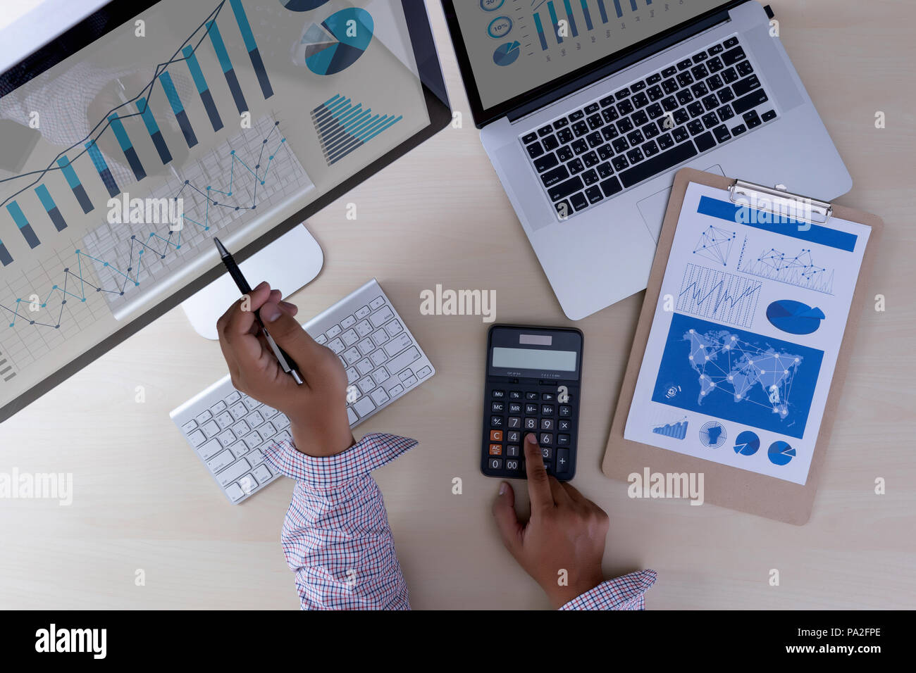 analyzing the work Accounting on Laptop investment concept Stock Photo ...