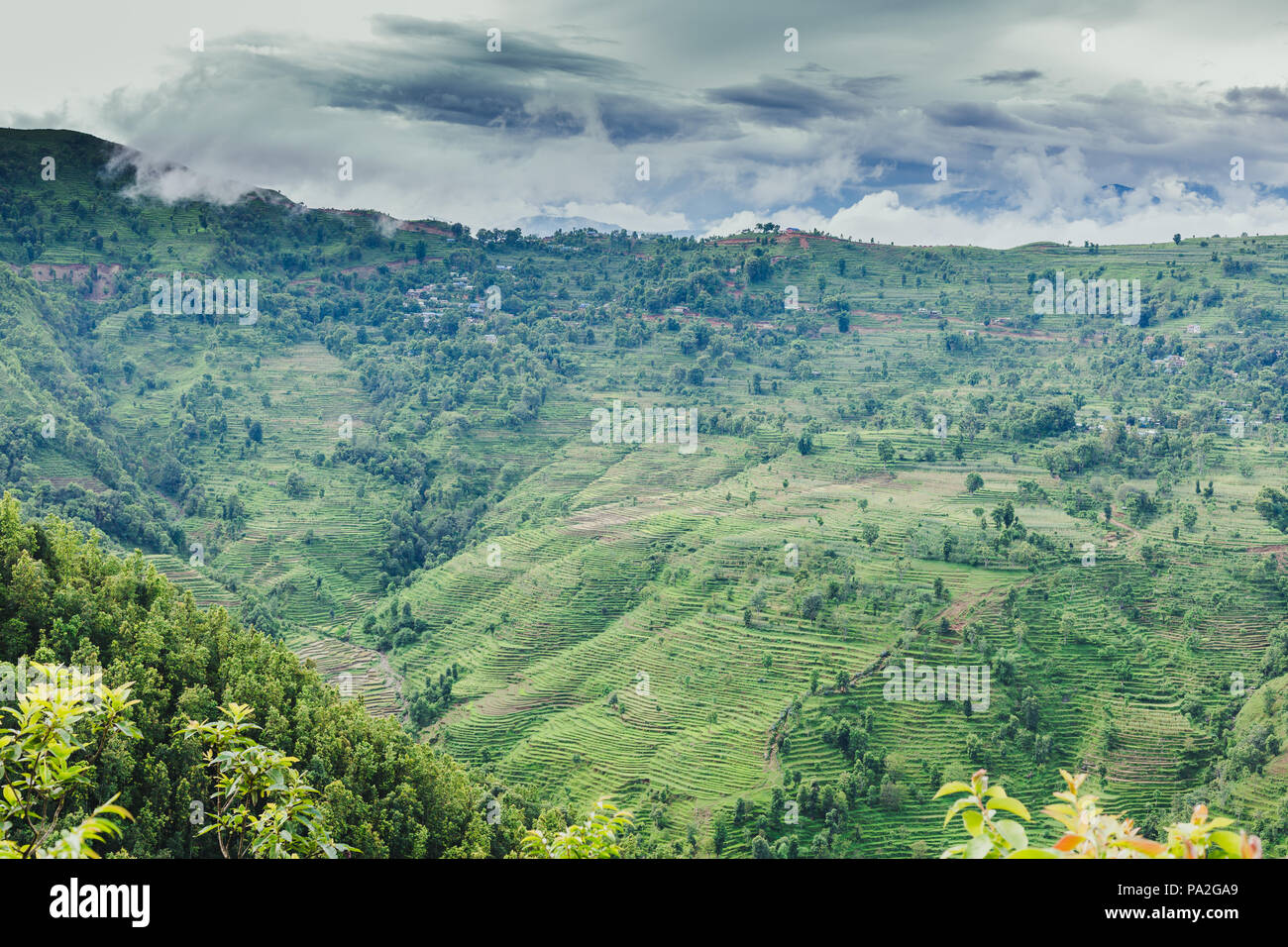 Scenery of beautiful Nepali rural village with mountains and green ...