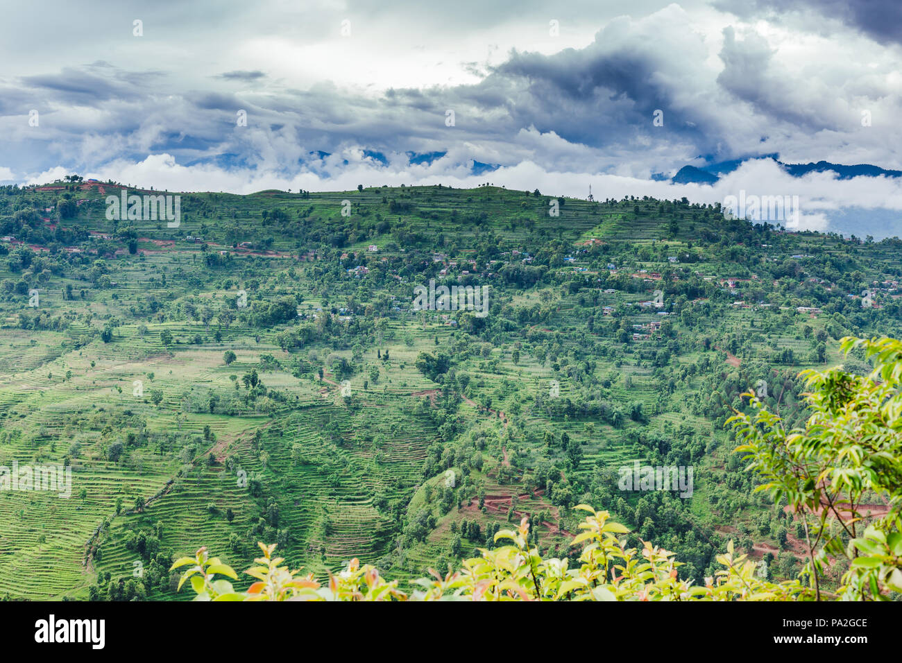 Scenery of beautiful Nepali rural village with mountains and green ...