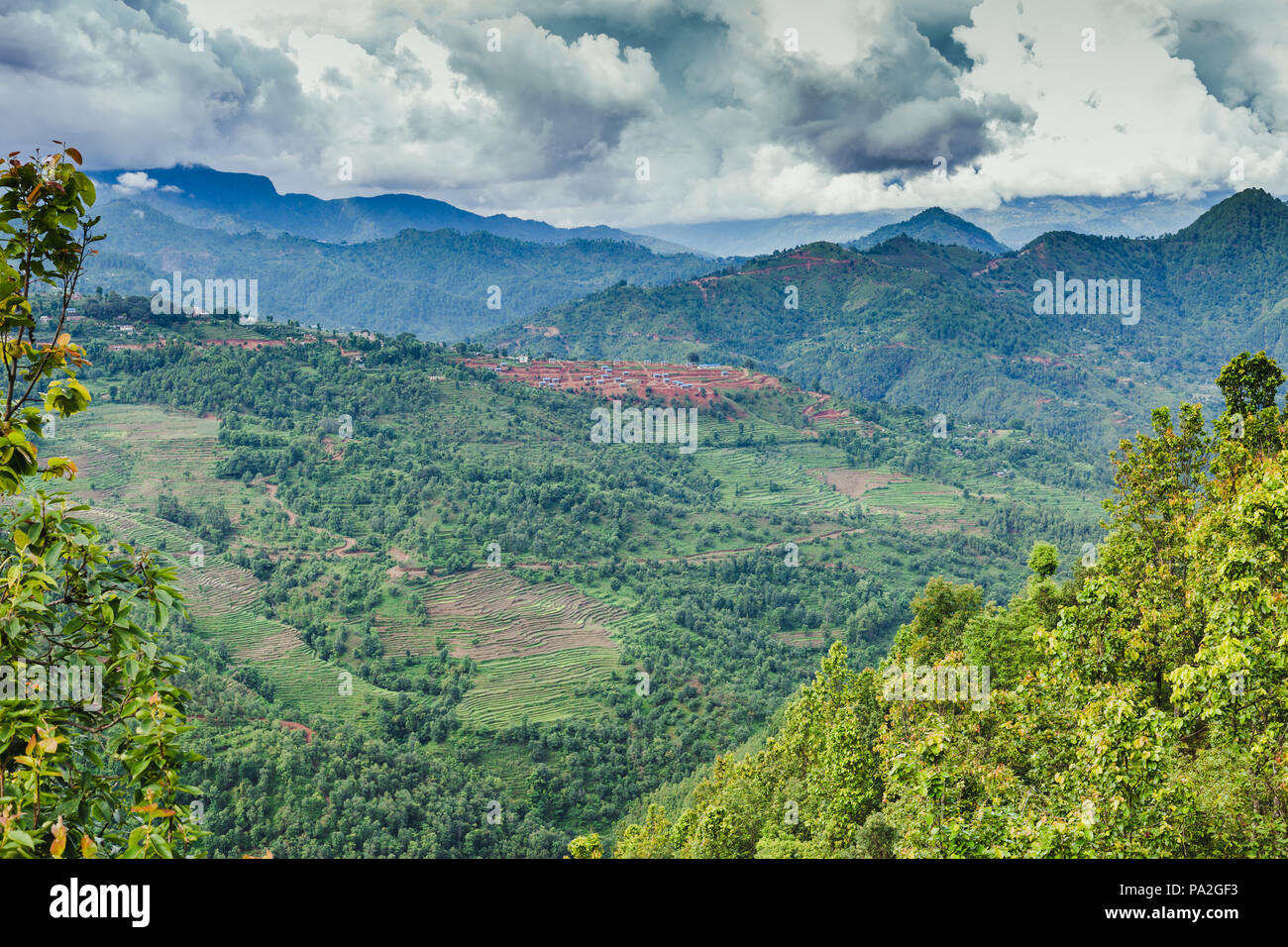 Scenery of beautiful Nepali rural village with mountains and green ...