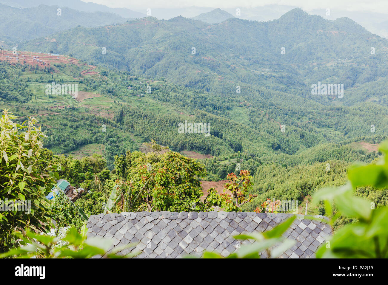 Scenery of beautiful Nepali rural village with mountains and green ...