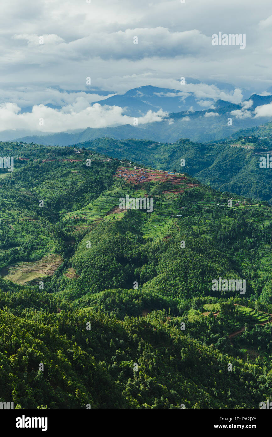 Scenery of beautiful Nepali rural village with mountains and green ...