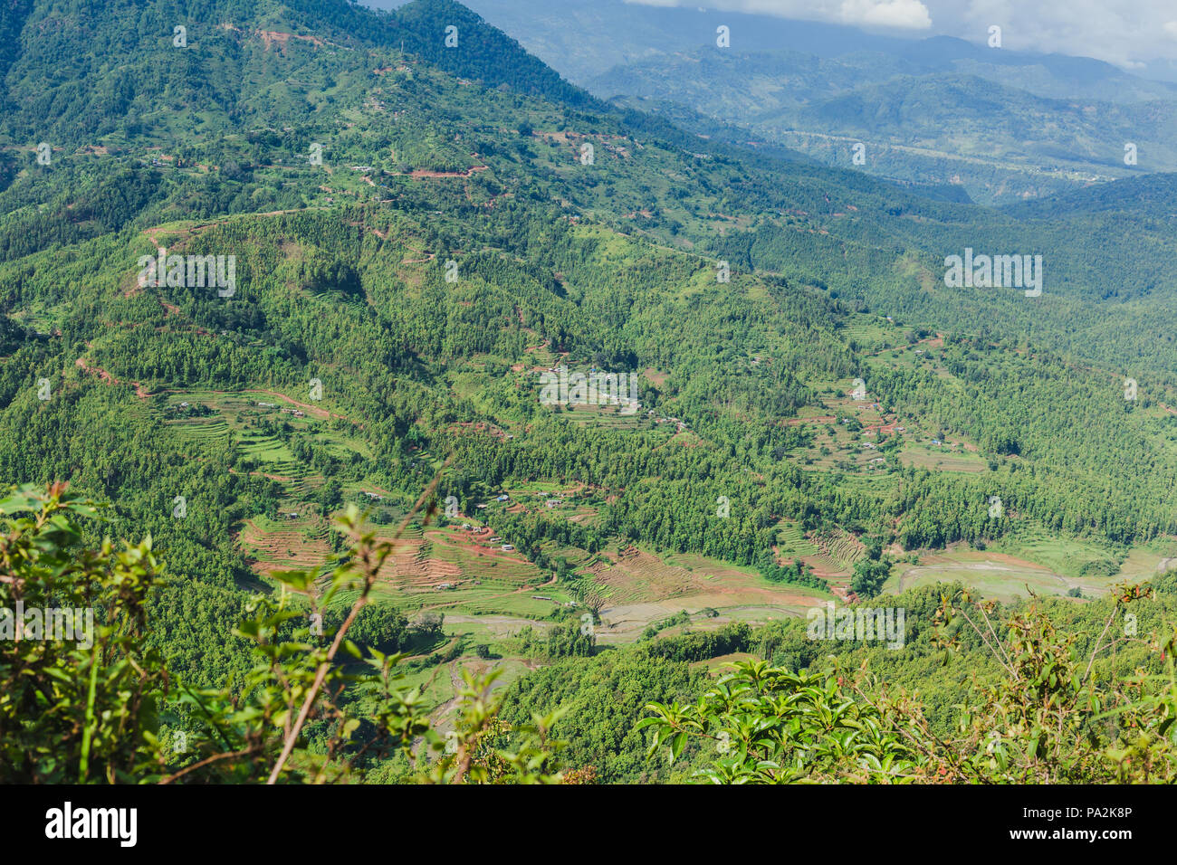 Scenery of beautiful Nepali rural village with mountains and green ...
