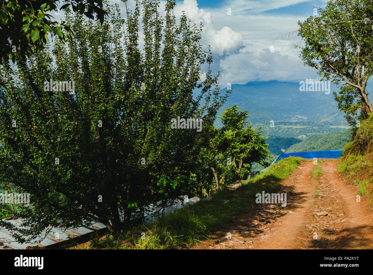 Scenery of beautiful Nepali rural village with mountains and green ...