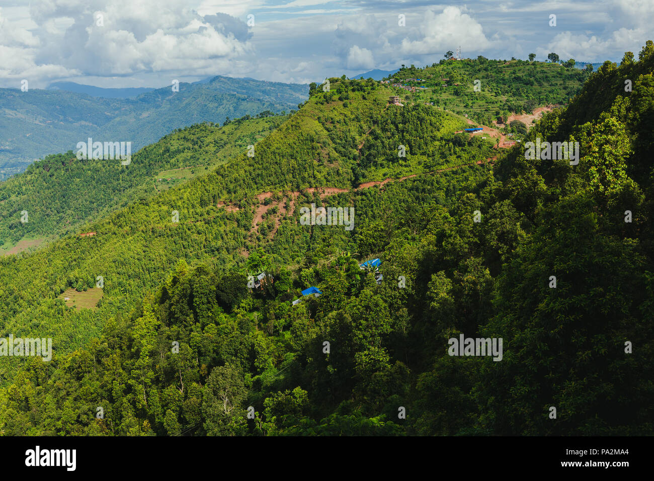 Scenery of beautiful Nepali rural village with mountains and green ...