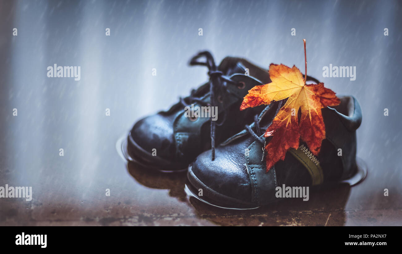Childs shoes puddle hi-res stock photography and images - Alamy