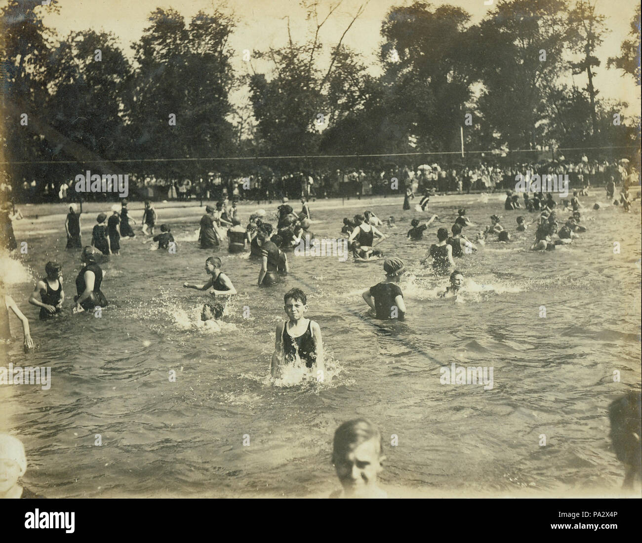 5 "Swimmers to be!" Children and instructors at work at swimming ...