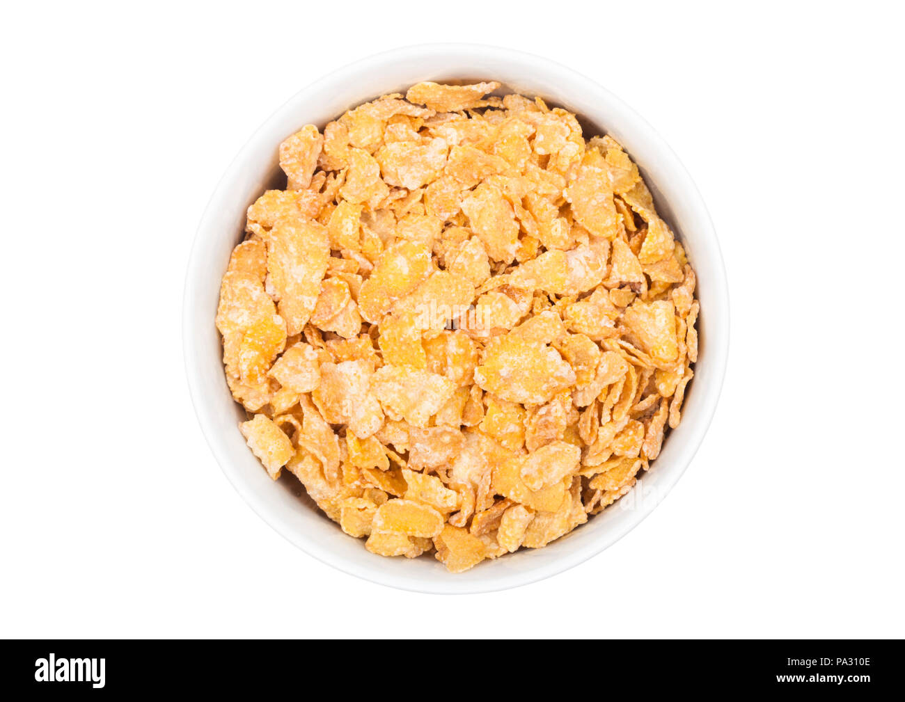 White bowl with natural organic granola cereal corn flakes on white.Top ...