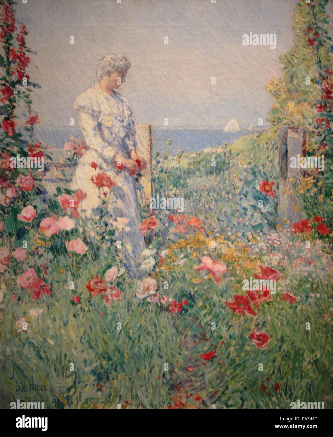 292 Celia Thaxter in Her Garden by Childe Hassam Stock Photo - Alamy