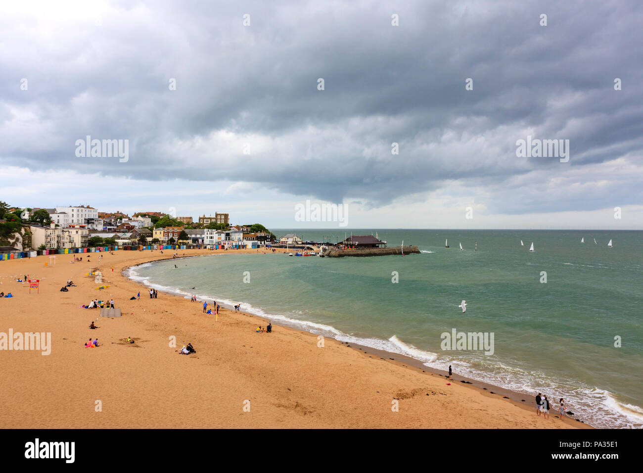 Broadstairs Viking Bay beach, Bleak House and harbour with few people ...
