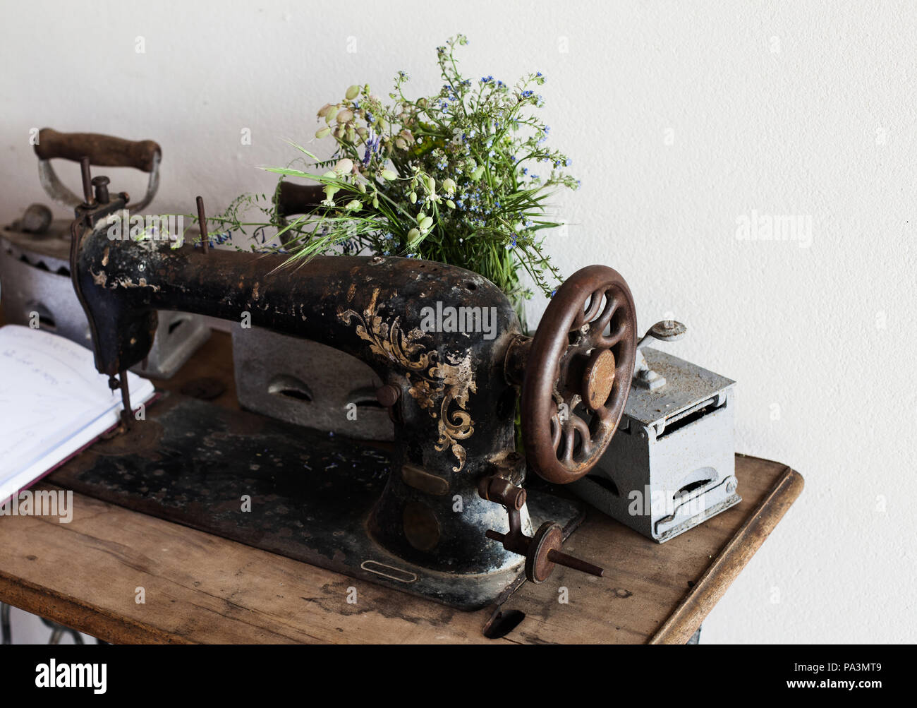 Old sewing machine, old-fashioned manufacturing Stock Photo - Alamy