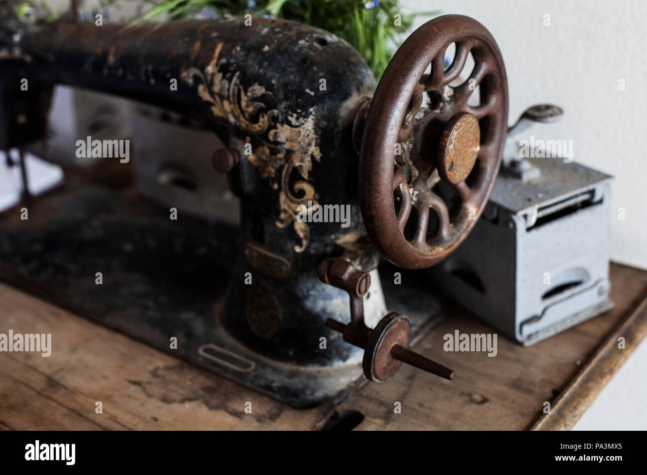 Old sewing machine, old-fashioned manufacturing Stock Photo - Alamy