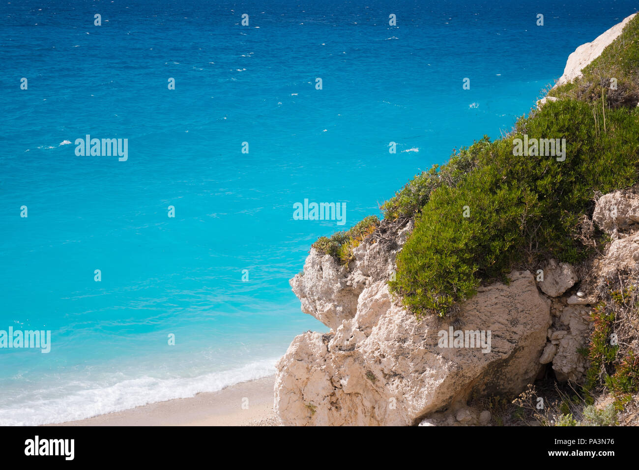 Blue ocean and white rocks and sand in Lefkada, Greece Stock Photo - Alamy