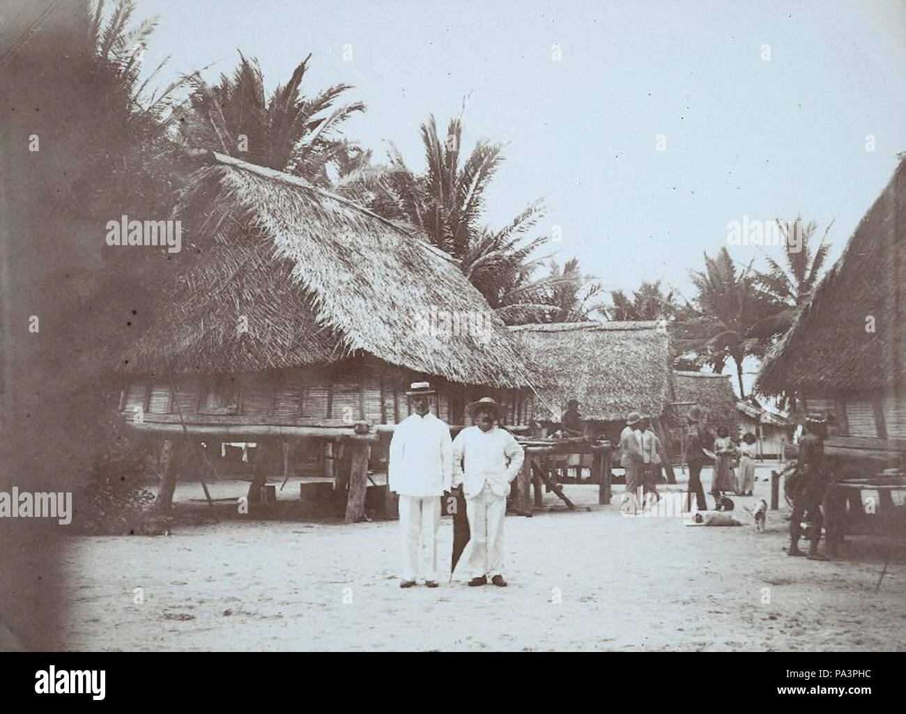 197 Peter Olsen and Harry O'Keefe in a village on the Mapia Islands ...