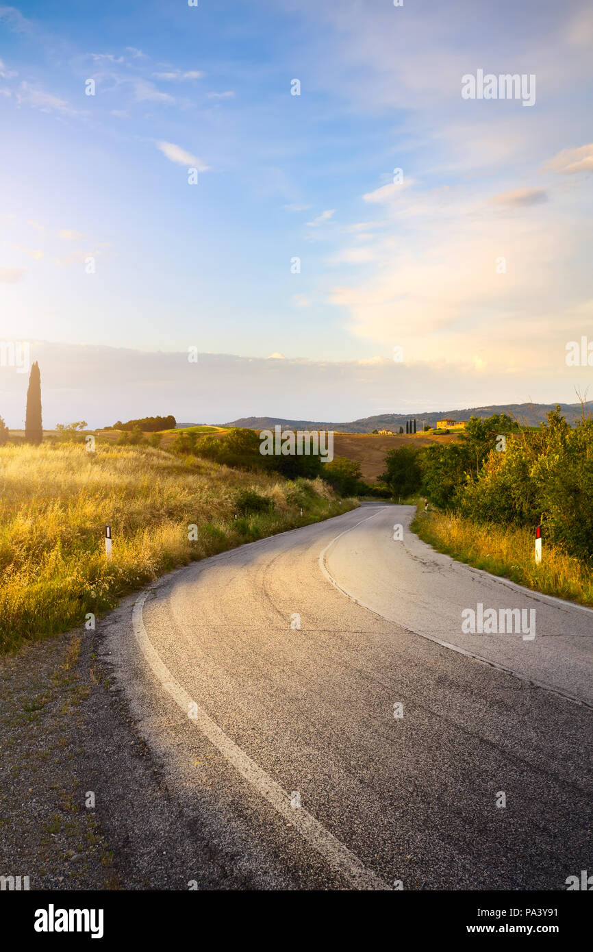 beautiful winding country road leading through rural countryside in the ...