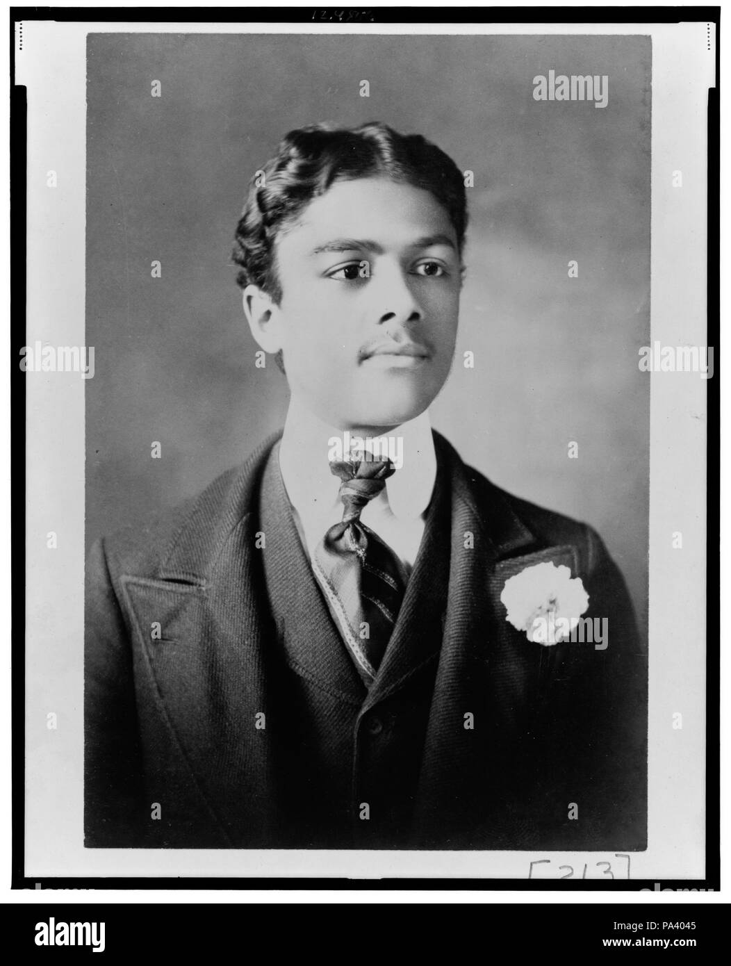 104 African American man, head-and-shoulders portrait, facing slightly ...