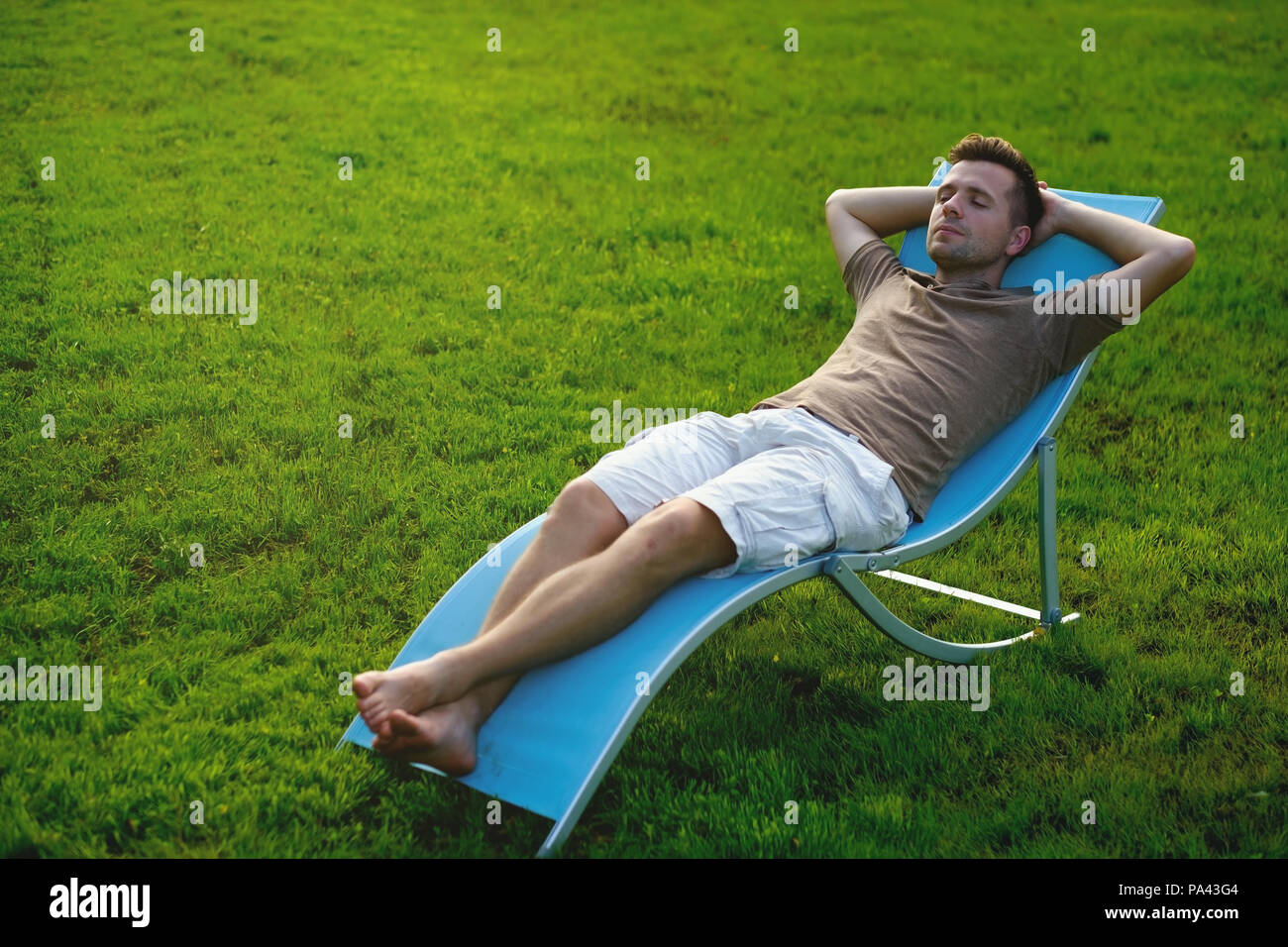Hand resting on arm chair hi-res stock photography and images - Alamy