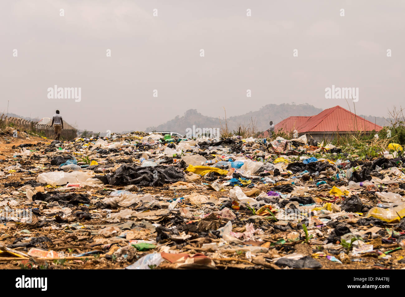 A dump of old rubber bags causing environmental hazard in the city ...