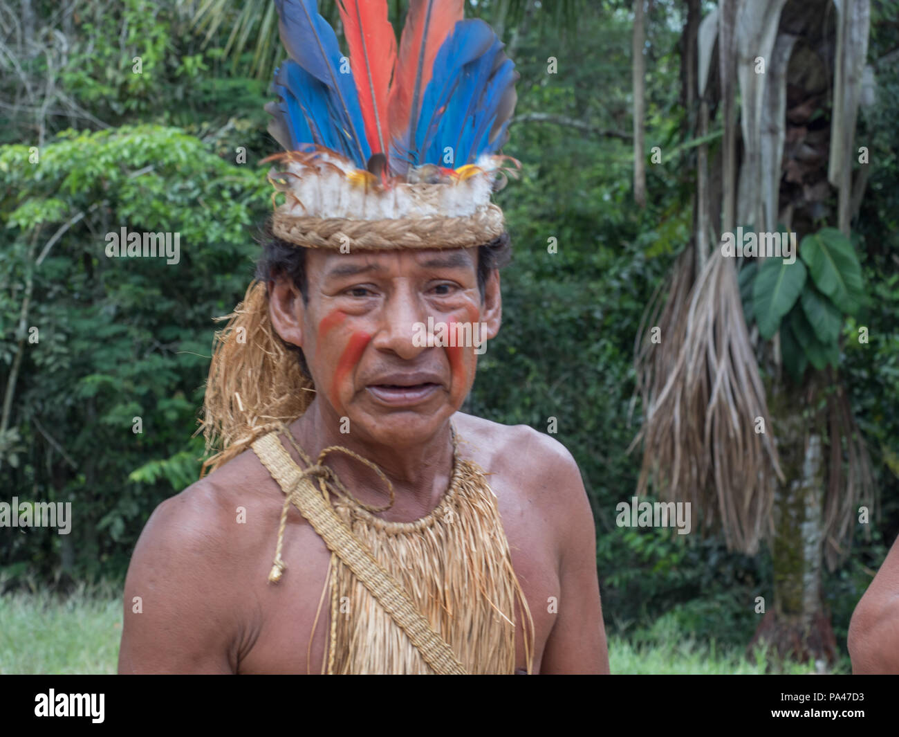 Iquitos, Peru- Mar 28, 2018: Indian from Yagua tribe in his local ...
