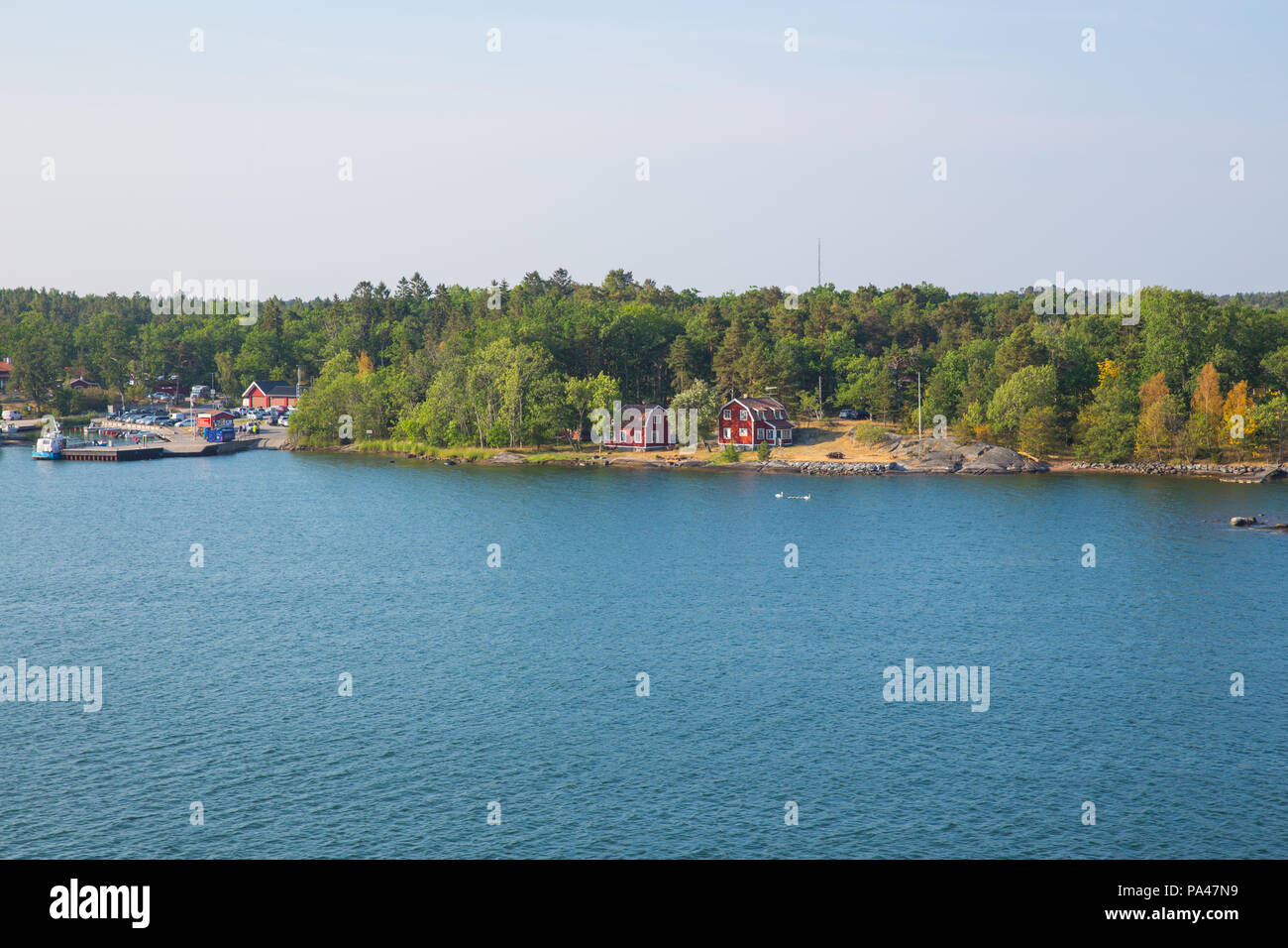 City Stocholm, Sweden. Islands, water and houses. Sunny day many trees ...