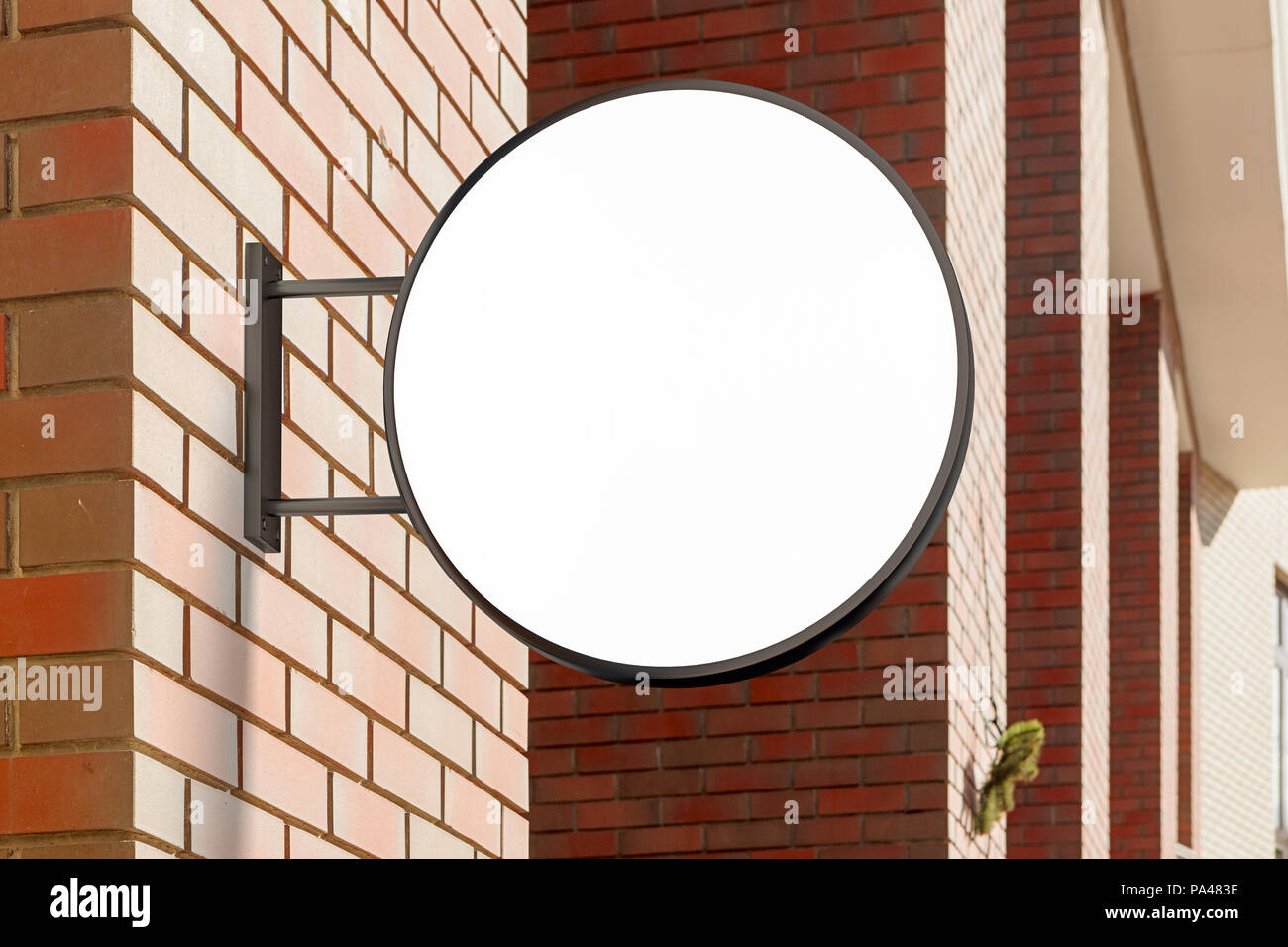 Blank shop sign om brick wall. Round signage mockup. 3d illustration ...