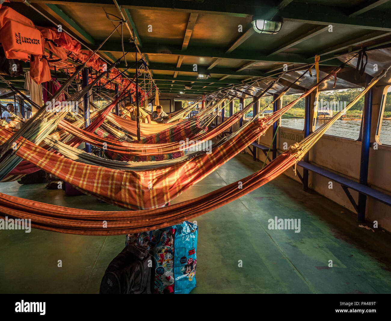 Amazon River, Peru - March 25, 2018: Beautiful, colorful hammocks on ...
