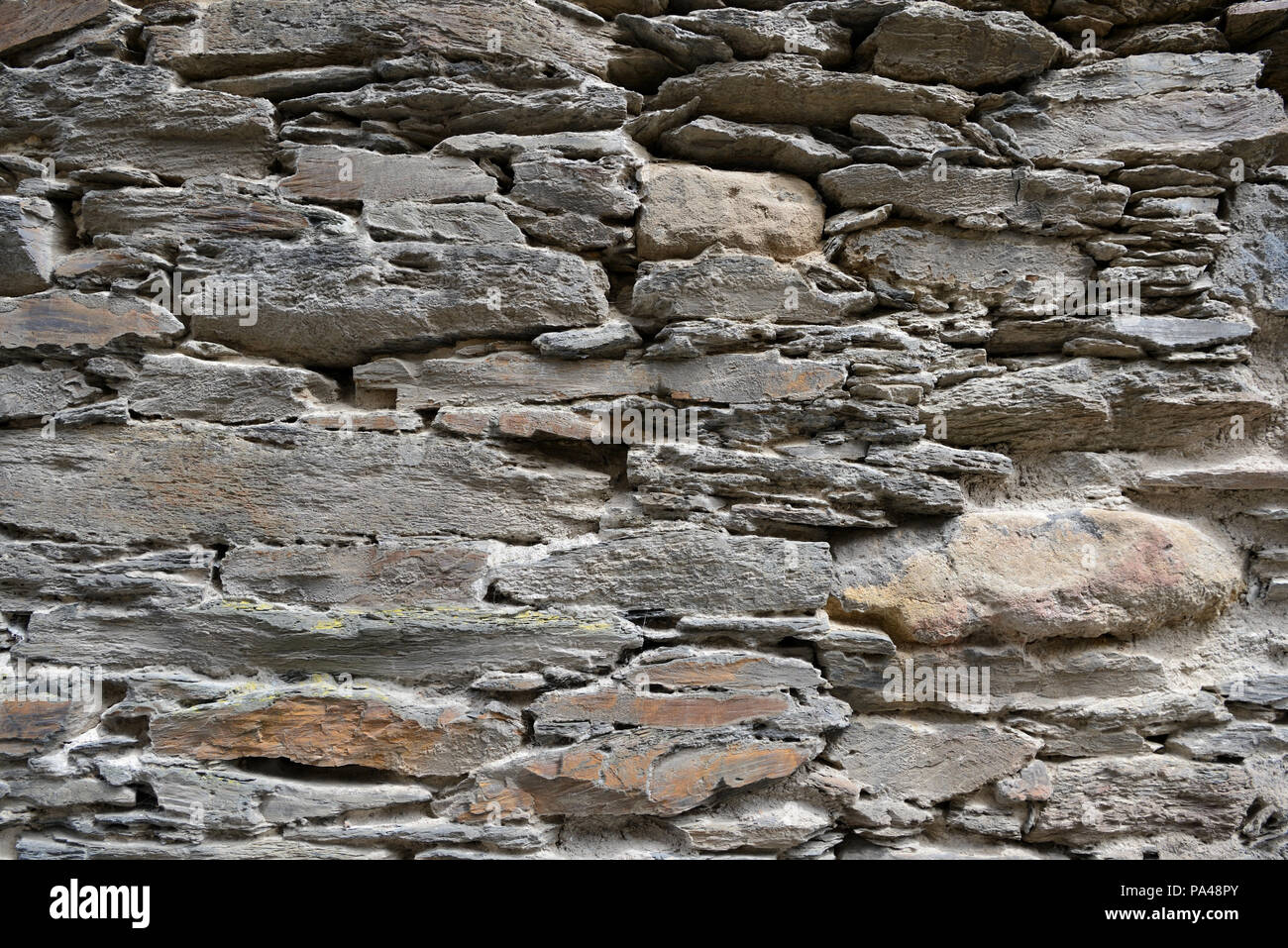 Ancient stone wall background and texture Stock Photo - Alamy
