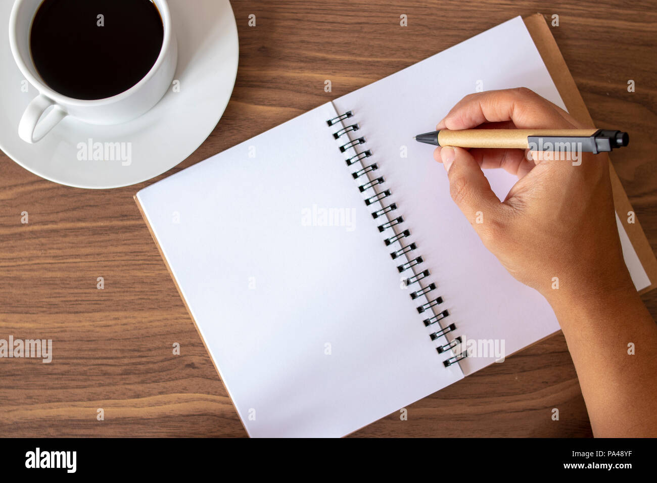 Writing inspired notes with coffee Stock Photo - Alamy