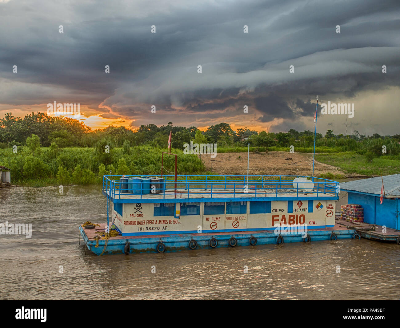 Sunset and dramatic clouds before the storm on the sky over the Amazon ...