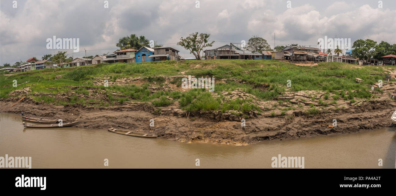 Small village on the bank of Javari River, the tributary of the Amazon ...